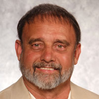 Headshot—French | IIBEC